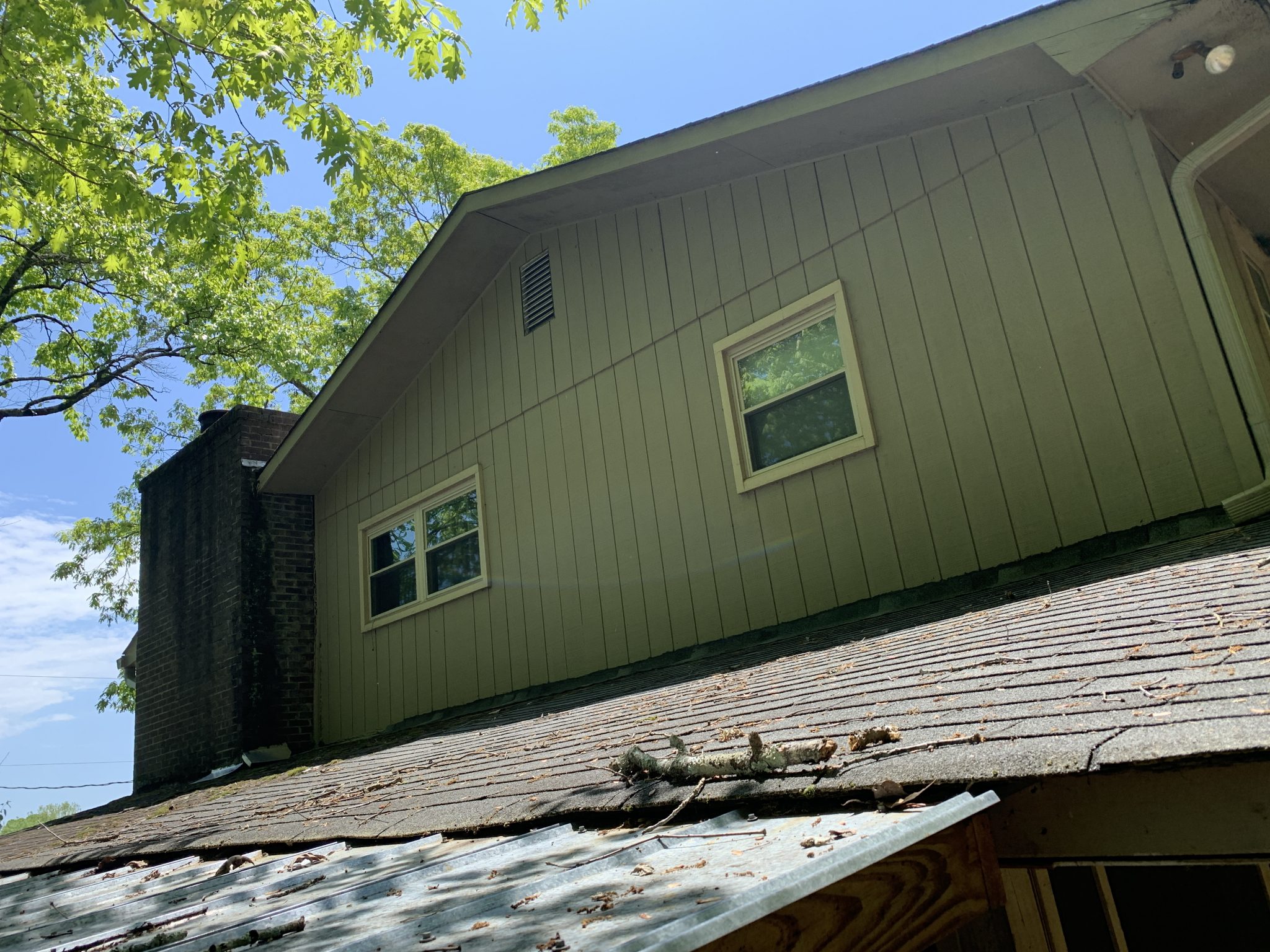 Replacement of old three tab roof with Owens Corning Oakridge Teak shingles