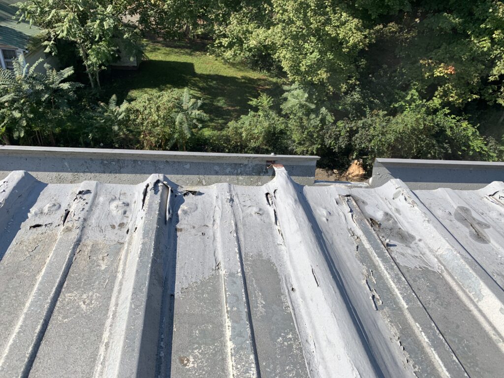 Sealant cracking at the edge of metal roof - Litespeed Construction ...