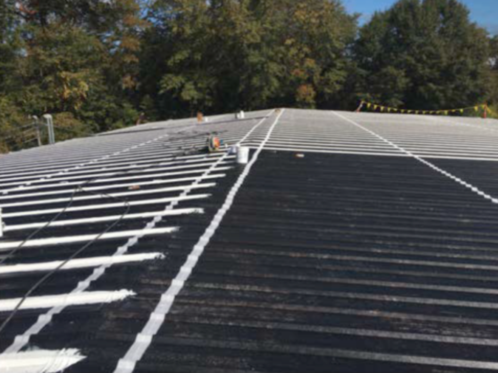 Coating a commercial metal roof: screws, horizontal laps, penetrations ...